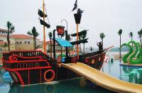 China ROHS Mini Water Park Equipment Wood Pirate Ship With Fiberglass Slide for sale