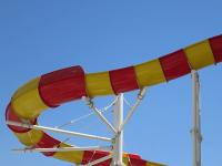 China Super Boomerang Water Slide Fiberglass Commercial Water Slide Theme Water Park for sale