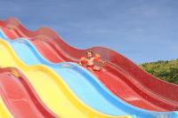 China Adult Rainbow Fiberglass Water Slide For Resort Park for sale
