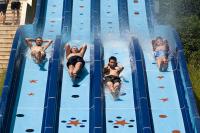 China Adult Rainbow Fiberglass Water Slide For Resort Park for sale