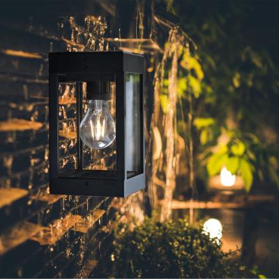 China Solar Wall Sconce Light 5V 2W IP54 Waterproof Outdoor Glass Panel Lantern with 2000mAh Battery for sale
