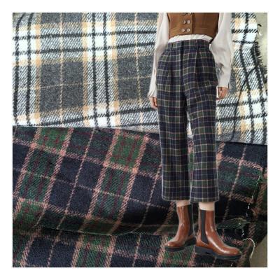 China 280 GSM 100% Polyester Crinkle Grid Woven Fabric for Dress Garment Textile Manufacturing for sale
