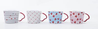 China Valentine Heart Pattern Ceramic Mug Set with Red Curved Handle, 4-Piece Romantic Love Themed Coffee Cup Collection for sale