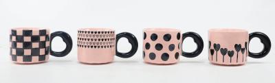 China Pink Base Black Pattern Heart Handle Ceramic Mugs for sale