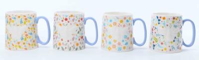 China Embossed Wildflower Ceramic Mug with Blue Handle for sale