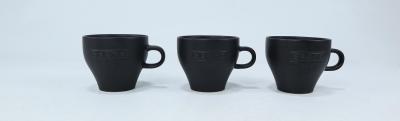 China Matte Black Embossed BEANZ Cafe Ceramic Coffee Mugs, Curved Wide Body Minimalist Café Style Mug Set for sale