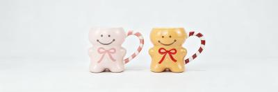 China Set of 2 Cute 3D Gingerbread Man Ceramic Mugs, Pink & Yellow Christmas Couple Mugs with Striped Candy Cane Heart Handle, Holiday Gift Coffee Cups for sale