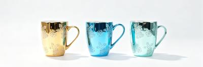 China Metallic Mirror Christmas Ceramic Mugs with White Snowflake Bell Pattern, Electroplated Gold Blue Mint Coffee Tea Cups, Holiday Winter Decor Drinking Mugs, Xmas Gift Mugs for Family for sale