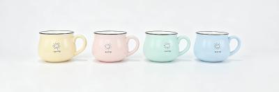 China Cute Pastel Sunny Face Wide Belly Ceramic Mugs, Black Rim Hand Drawn Smile Sun Handle Tea Cups for sale