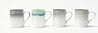 China Collection Overview This 4-piece  ceramic mug collection showcases unique handcrafted speckled reactive glaze with organic mottled texture covering the entire cup body, paired with a clean off for sale