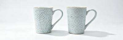 China 2 Pack Embossed Light Blue Ceramic Coffee Mugs for sale