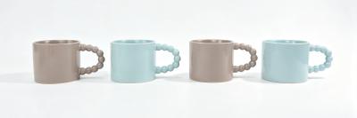 China 4 Pack Glossy Ceramic Mugs with Unique Beaded Bubble Handles, Neutral Pastel Coffee Cup Set for sale