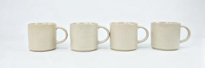 China 4‑Piece Cream Embossed Ceramic Mug Set, Neutral Textured Coffee Mugs for sale