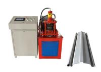 China Galvanized Steel Shutter Door Roll Forming Machine Flexible With Punching Holes for sale