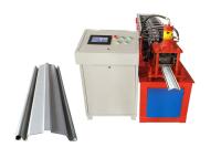 China Embossing Type Shutter Door Roll Forming Machine With Cr12 Heat Treatment Cutter for sale