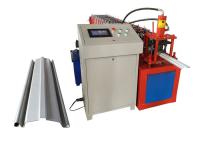 China Embossing Type Shutter Door Roll Forming Machine With Cr12 Heat Treatment Cutter for sale
