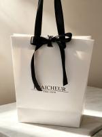 China Space saving foldable Recycled Gift Bags crafted from white art paper with customizable logo and ribbon color perfect for retail and gifting for sale