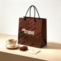 China Recycled Gift Bags Foldable Paper Shopping Bags with Black Twisted Rope Handles and Custom Size Options for Giveaways for sale