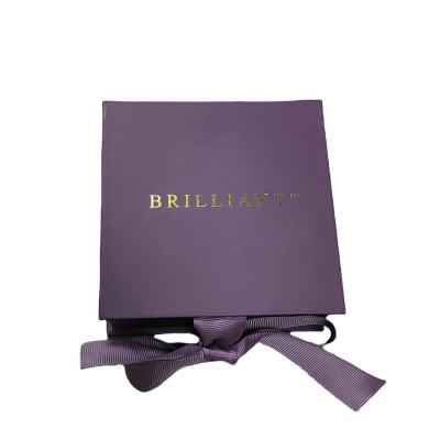 China Jewelry Paper Box constructed from textured hard paper board with flip top design and soft inner lining for jewelry protection for sale