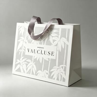 China Recycled Gift Bags with Customizable Surface Printing Foil Stamp Embossment and Inner Foam Shape for Wrist Watch Packaging for sale