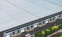 China Modern Prefabricated Steel Structure Workshop Building With Sandwich Panel And Glass Curtain for sale