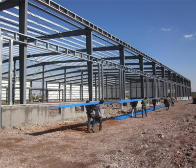China 110mm Downpipe Welded Portal Steel Structure Warehouse for sale