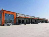 China Prefabricated Large Canopy Loading Bay High Rise Durable Steel Structure Warehouse for sale