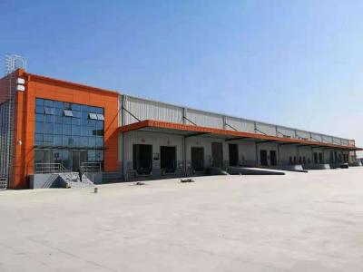 China Prefabricated Large Canopy Loading Bay High Rise Durable Steel Structure Warehouse for sale