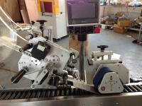 China 700W Automatic Horizontal Vial Labeling Machine Sticker Applicator Machine YM215 for sale