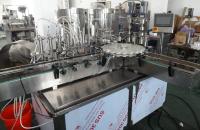 China 100ml E Liquid Gorilla Bottle Volumetric Filling Capping Machine For Syrup Servo Motor for sale