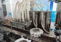 China 100ml E Liquid Gorilla Bottle Volumetric Filling Capping Machine For Syrup Servo Motor for sale