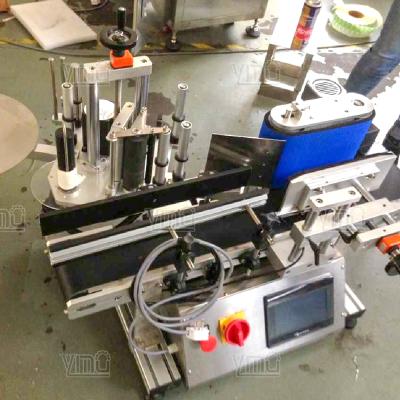 China YIMU YM400 Automatic Round Bottle Wrap-Around Labeling Machine: Table-Top Solution for Plastic Containers for sale