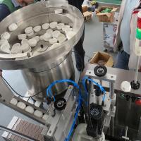 China RM100 Automatic Capping Machine ROPP Cap Screwing Machine Metal Bottle Cap Screw Capping Machine for Olive Oil and Wine for sale
