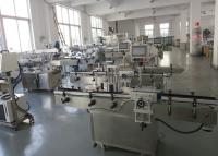 China PLC Water Juice Round Container Labeling Machine Tabletop Wrap Around Labeler for sale