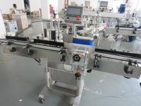 China PLC Water Juice Round Container Labeling Machine Tabletop Wrap Around Labeler for sale