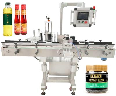China ODM Automatic Aluminum Oil Bottle Labeling For Round Bottles Machine 700W for sale