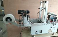 China Desktop Glass Round Tube Semi Automatic Bottle Labeler Machine 25mm-100mm for sale