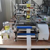 China Desktop Glass Round Tube Semi Automatic Bottle Labeler Machine 25mm-100mm for sale