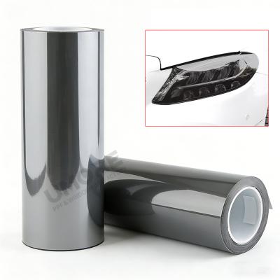 China Car Headlight UV Protection Film Black 6.5mil Photochromic PPF Headlight Film Anti Scratch for sale