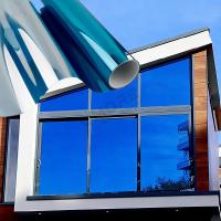 China Premium Silver Blue PET Solar Window Film 2mil Safety Tint Building UV Proof Window Film for sale