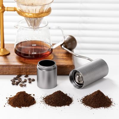 China Mini Camping Handheld Manual Coffee Bean Grinder Eco Friendly Wood Handle Metal for sale