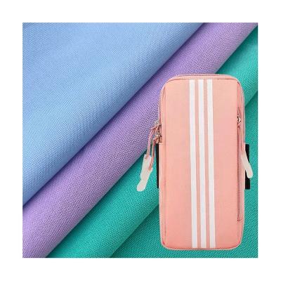 China Yarn Dyed Woven Polyester Single Jersey Knitted Fabric 4-Way Stretch 80-90gsm 142-155cm Width for sale
