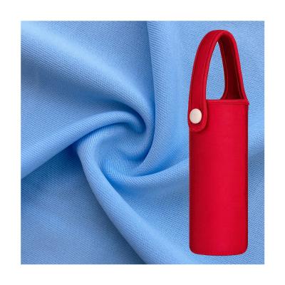 China Single Jersey Polyester Fabric 80-90gsm 142-155cm Width for Water Cup Covers and Industrial Applications for sale