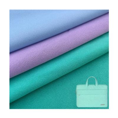China Single Jersey 4-Way Stretch Moisture Wicking 75D Polyester Fabric 142-155cm Width 80-90gsm for Laptop Bags for sale