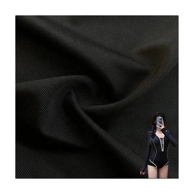 China Custom Swimsuit Fabric 88% Polyester 12% Spandex 142cm Width Moisture Wicking Waterproof for sale