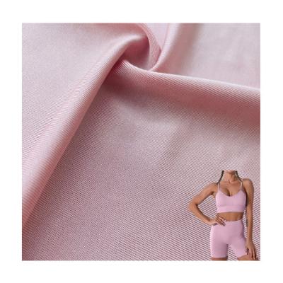 China 88% Polyester 12% Spandex Waterproof 55D Jersey Fitness Lycra Fabric for Swimwear Yoga for sale