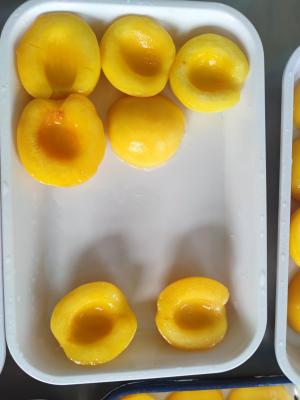 China Canned Yellow Peach Grade A GMO Firm Texture 820g Net Weight Syrup Preserved for sale