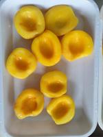 China Grade A Canned Yellow Peaches 820g Net Weight Brix 14-22% Shelf Stable Ready to Eat for sale