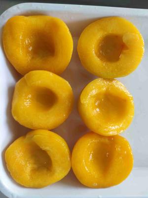 China Canned Yellow Peach 850g 24 Tins Per Carton No Preservatives Firm Texture Easy Open Lid for sale