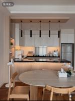 China Customizable Eco-Friendly Kitchen Cabinet with Fluted Island and LED Lighting for sale